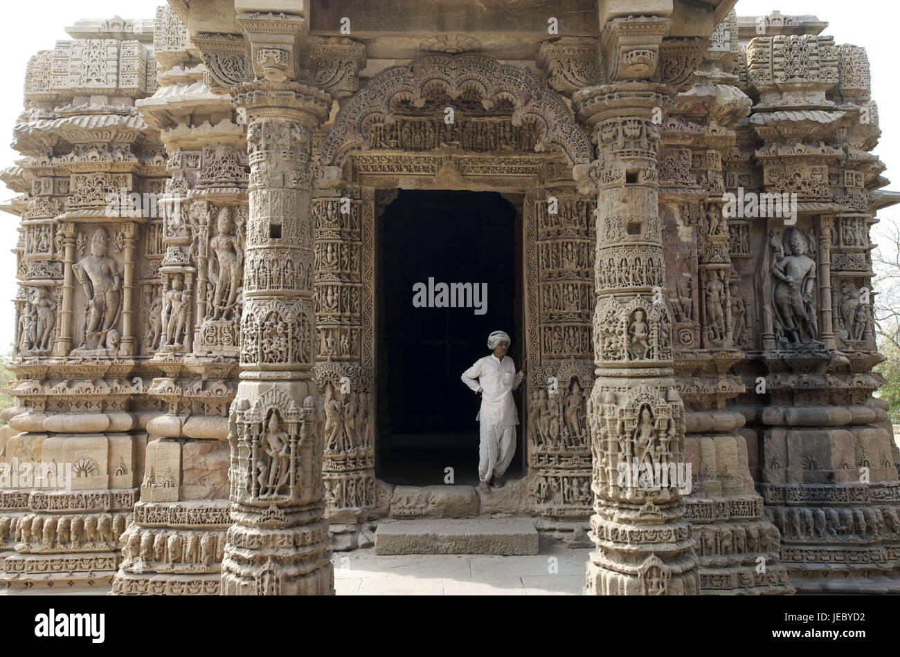 India, Gujarat, Modhera, Hindu solar temple, a man stands in the input ...