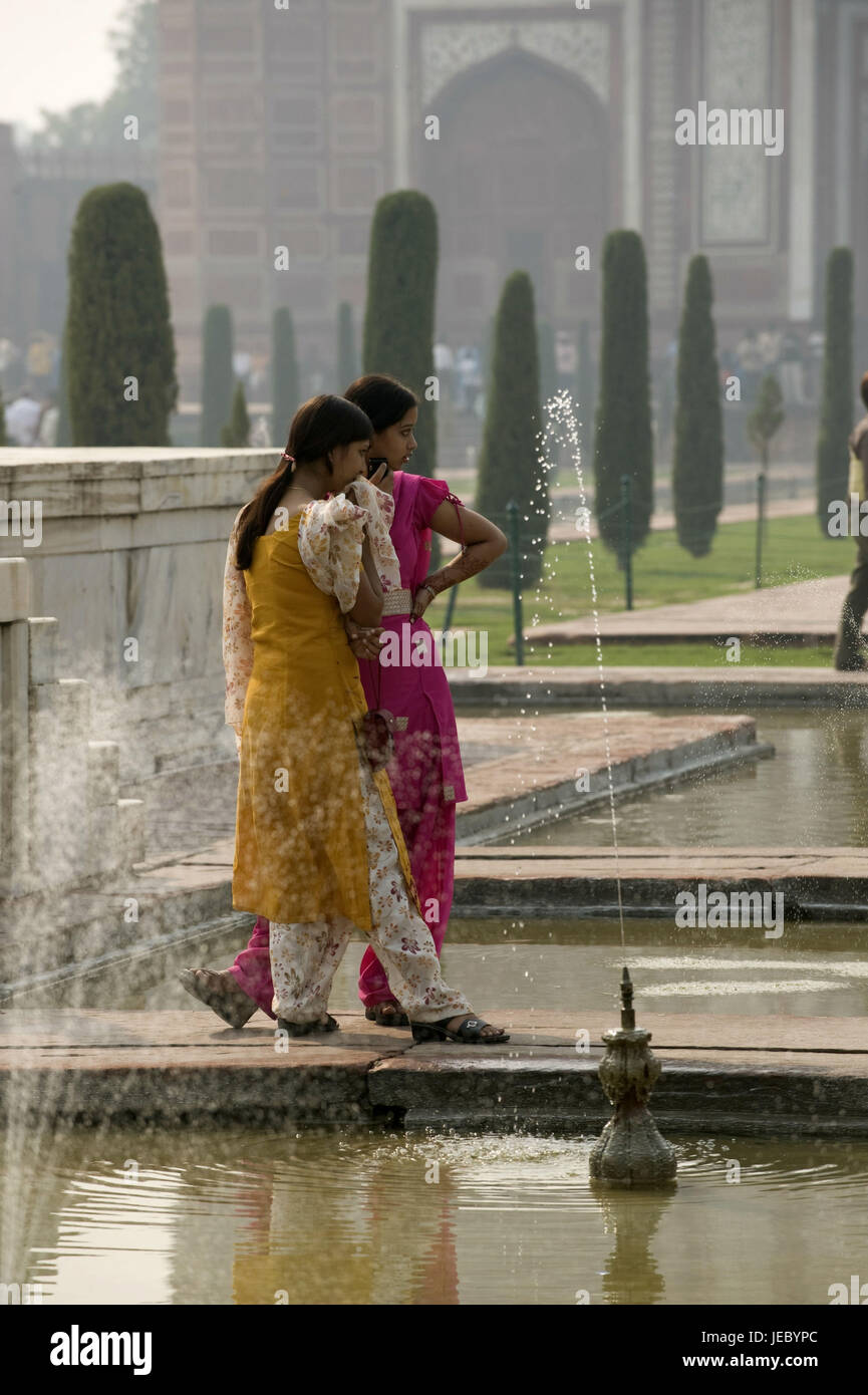 India, Uttar Pradesh, Agra, Two women before the Taj Mahal Stock Photo ...