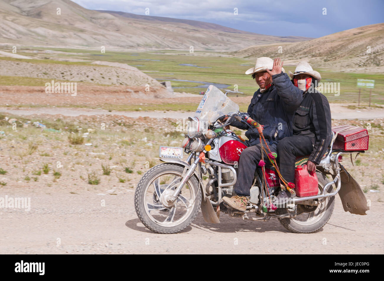 Locals drive motorcycle hi-res stock photography and images - Alamy