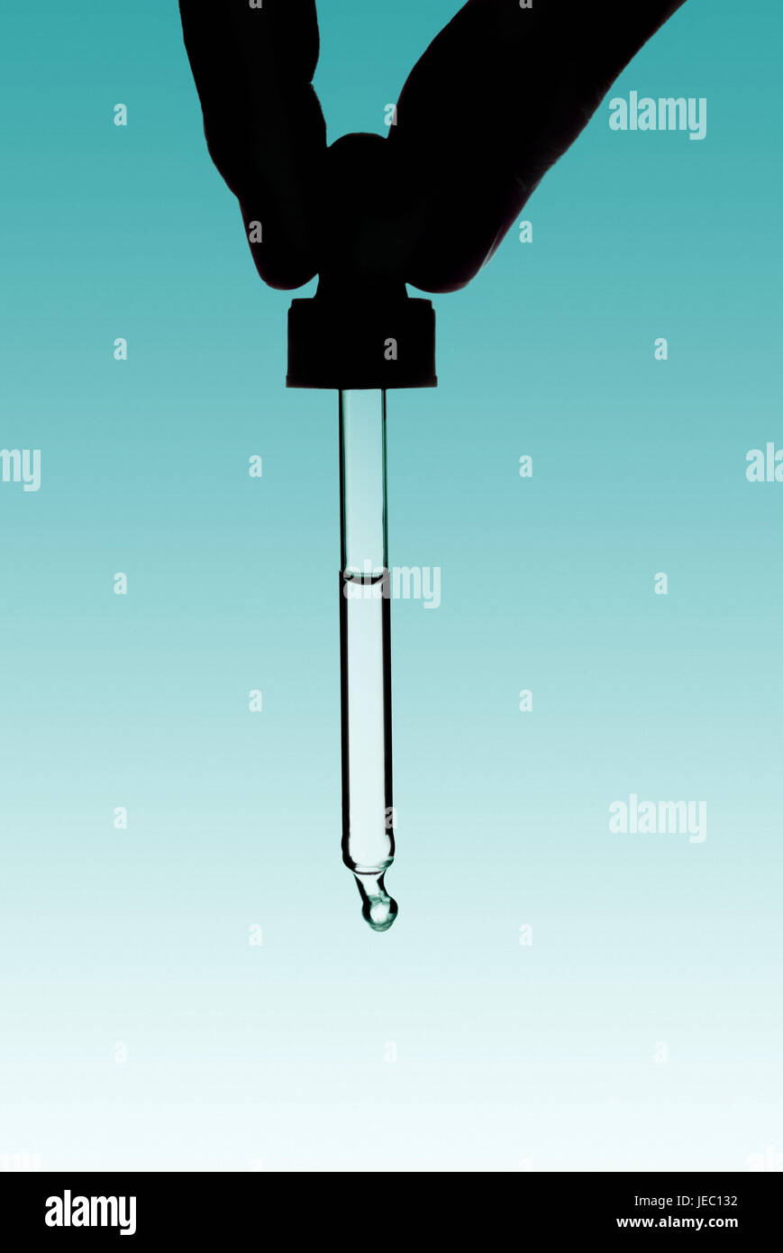 Hand with pipet Stock Photo - Alamy