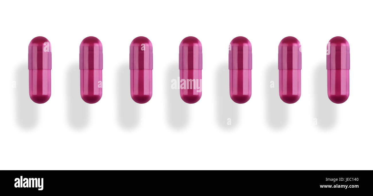 Taking capsule tablets Cut Out Stock Images & Pictures - Alamy