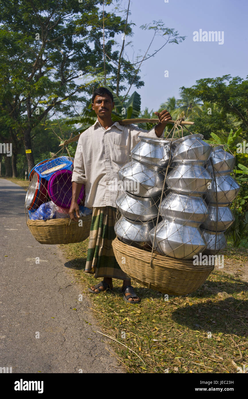 Man carries large amount in steel pots, Bangladesh, Asia Stock Photo ...