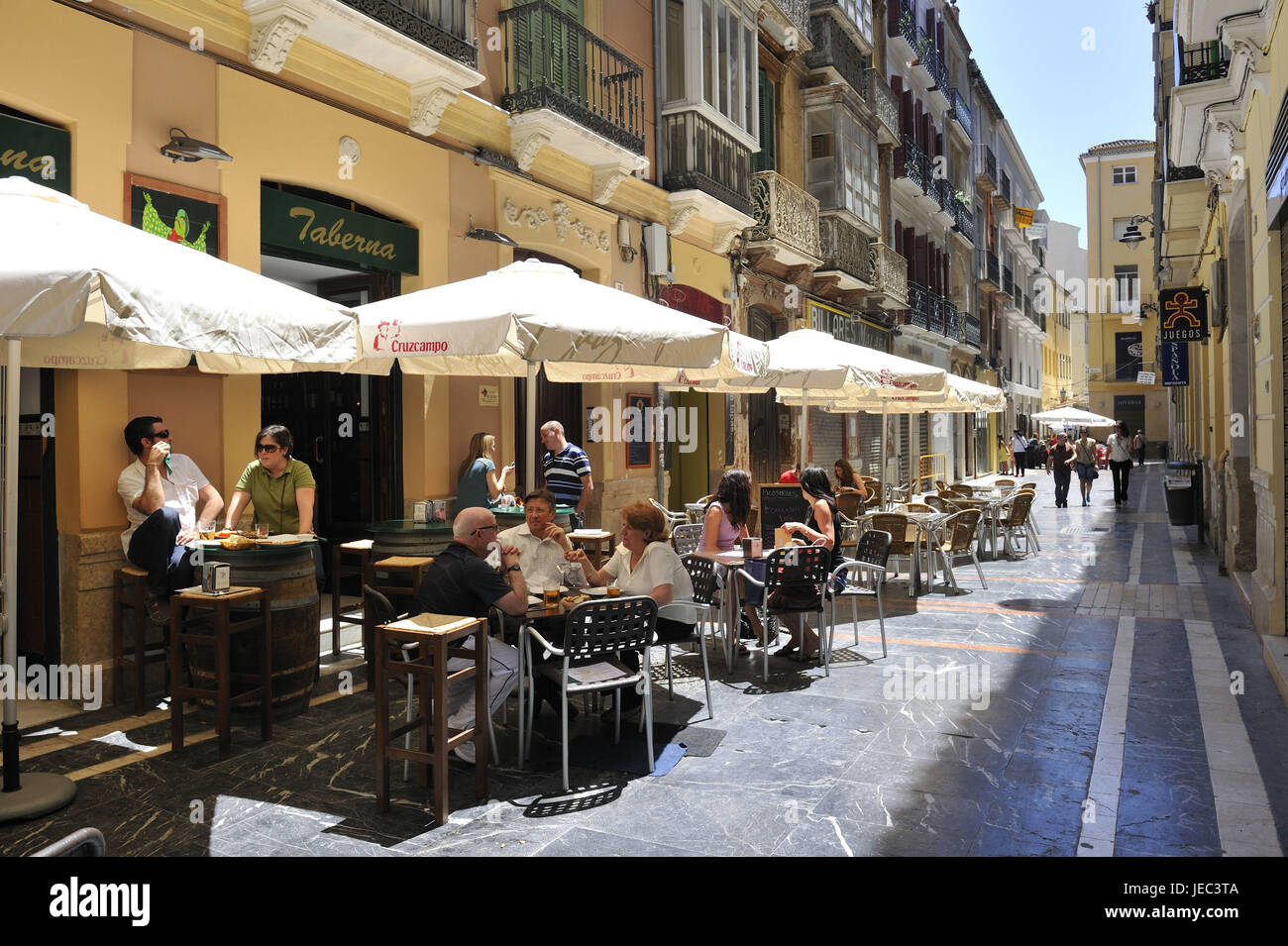 Spain, Malaga, tourist in a street cafe Stock Photo - Alamy