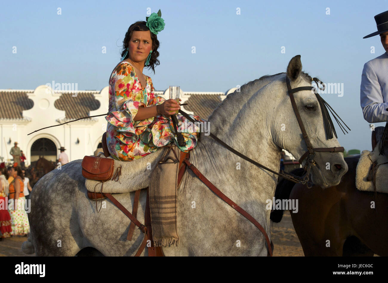 Spain, Andalusia, el Rocio, Romeria, woman in festive clothes on a ...