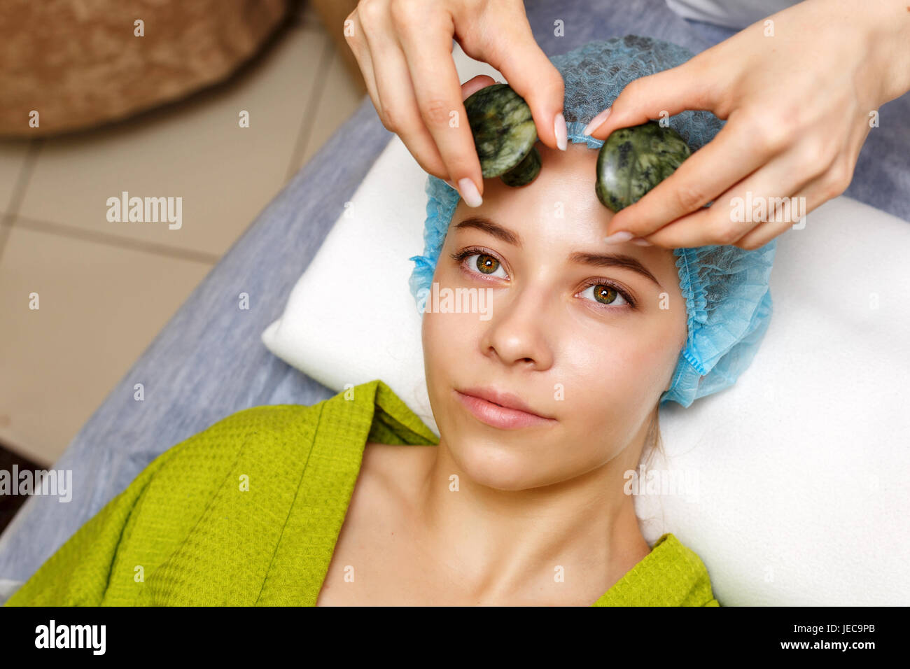 Woman having forehead massage hi-res stock photography and images - Alamy