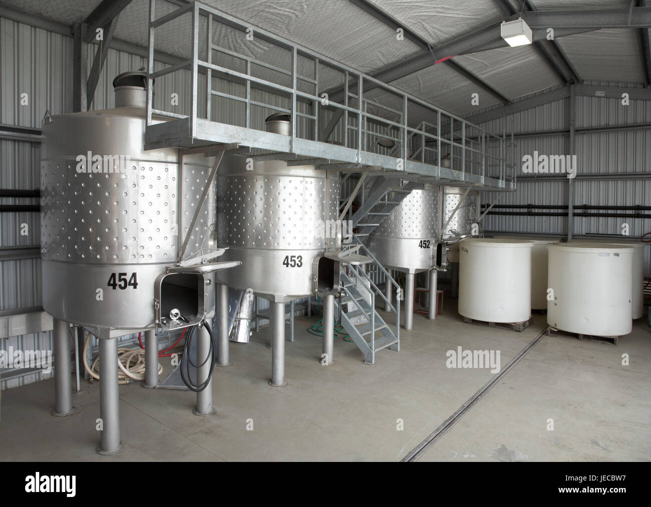 Stainless steel vats in winery Stock Photo - Alamy