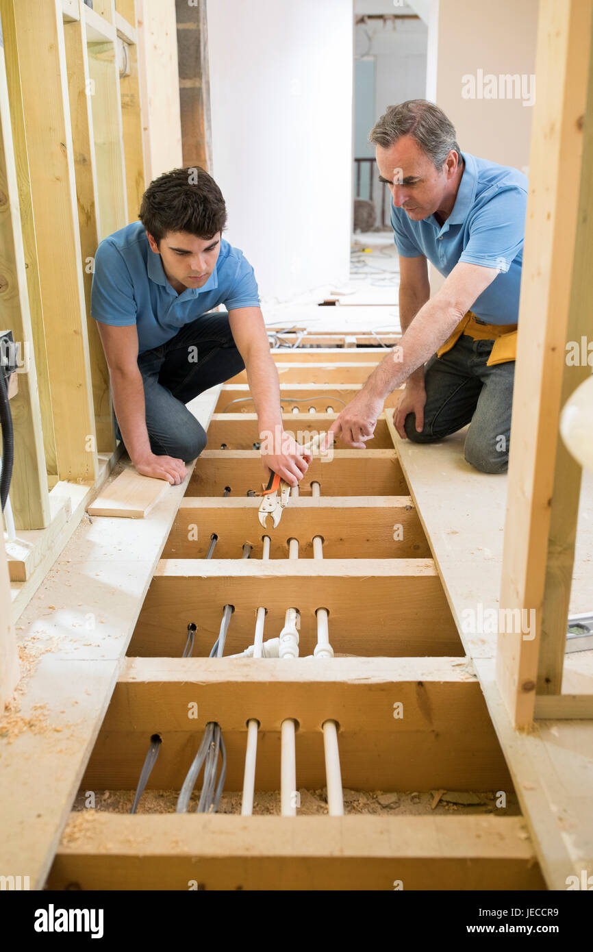 Instructing apprentice hi-res stock photography and images - Alamy
