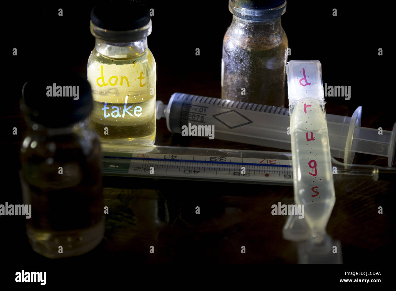 message against the drugs written on a medicinal flacons Stock Photo ...