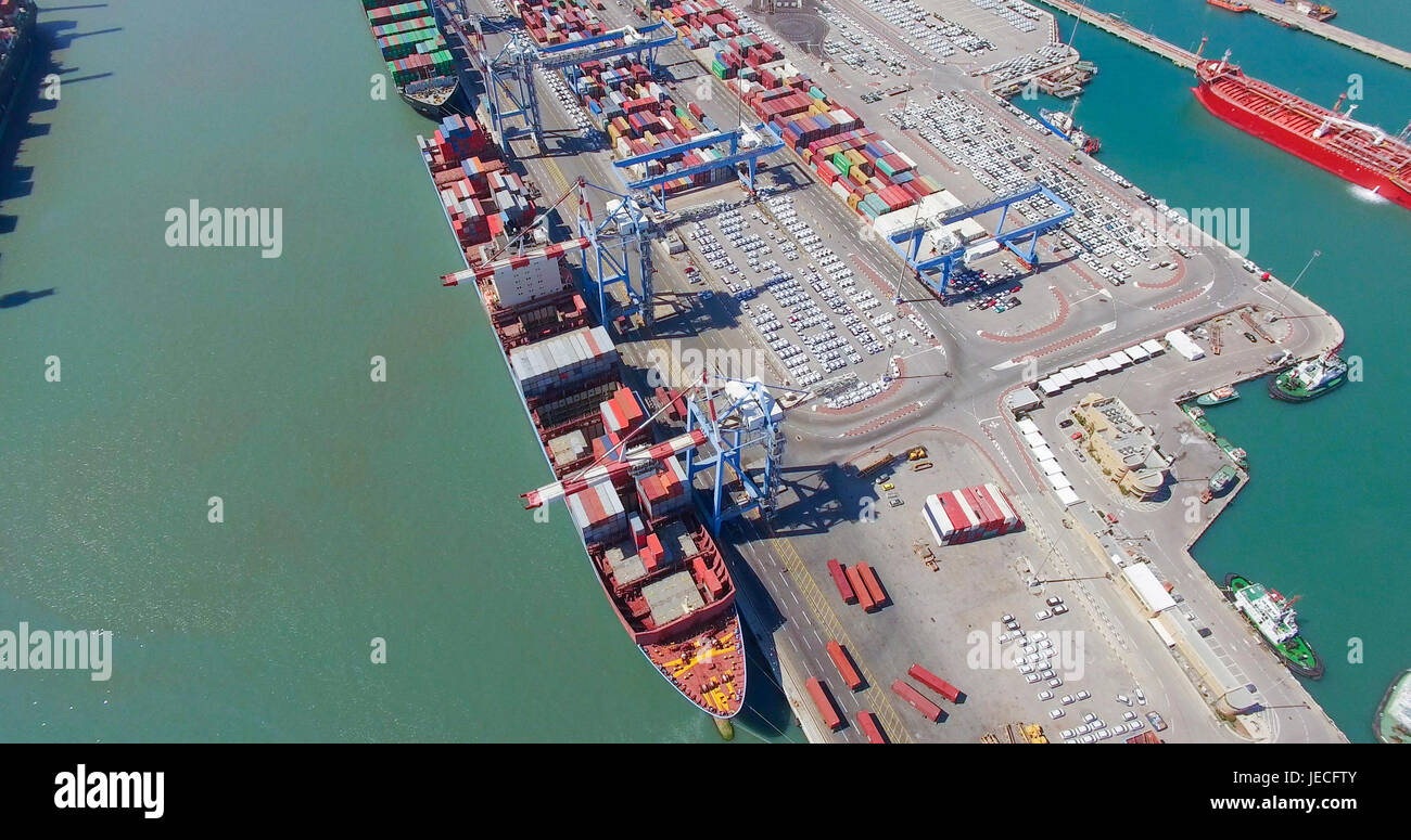 Commercial port with container ship - Top down aerial view Stock Photo ...