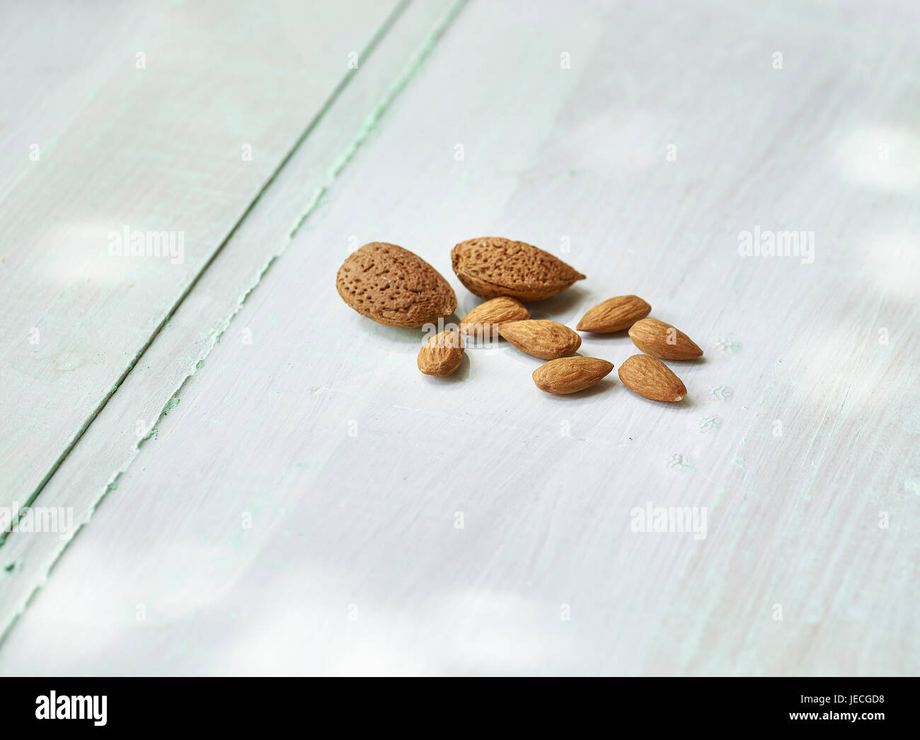 Shelled and whole almond nuts Stock Photo - Alamy