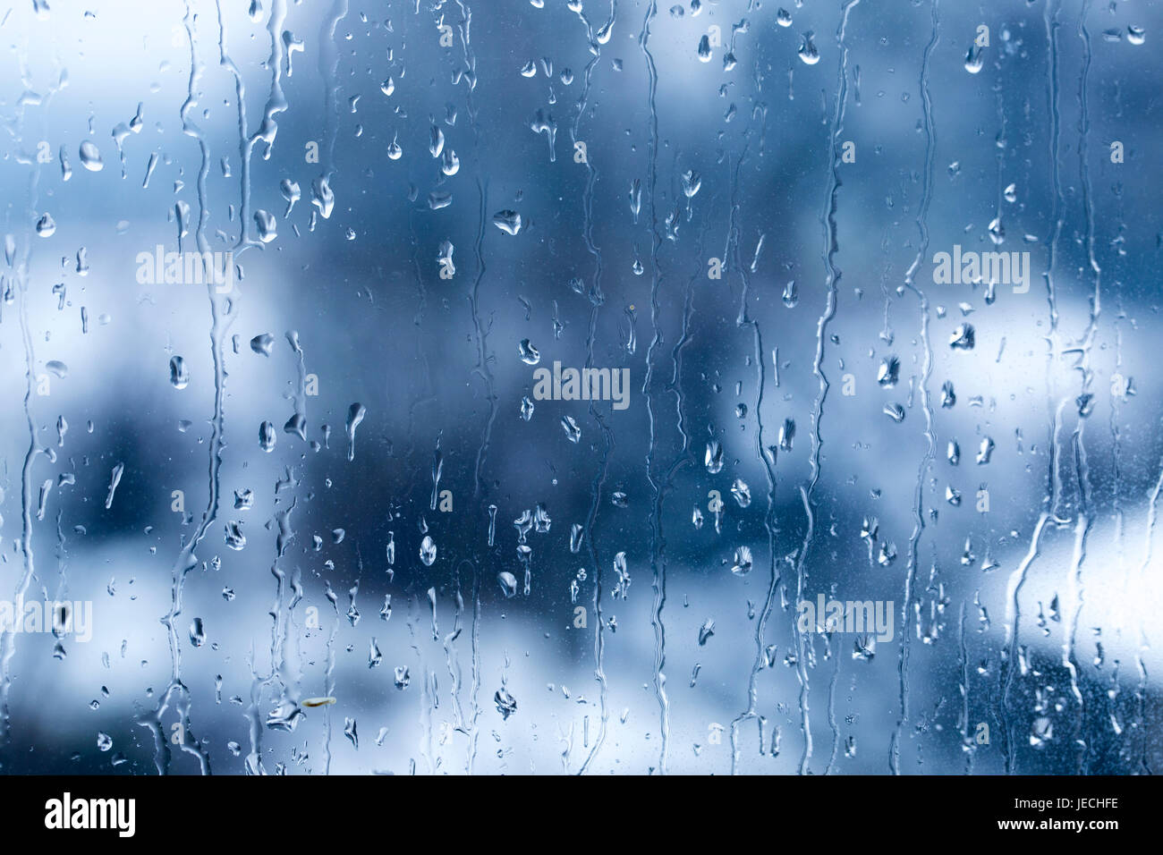 Rain drops on windows on a rainy autumn day Stock Photo - Alamy