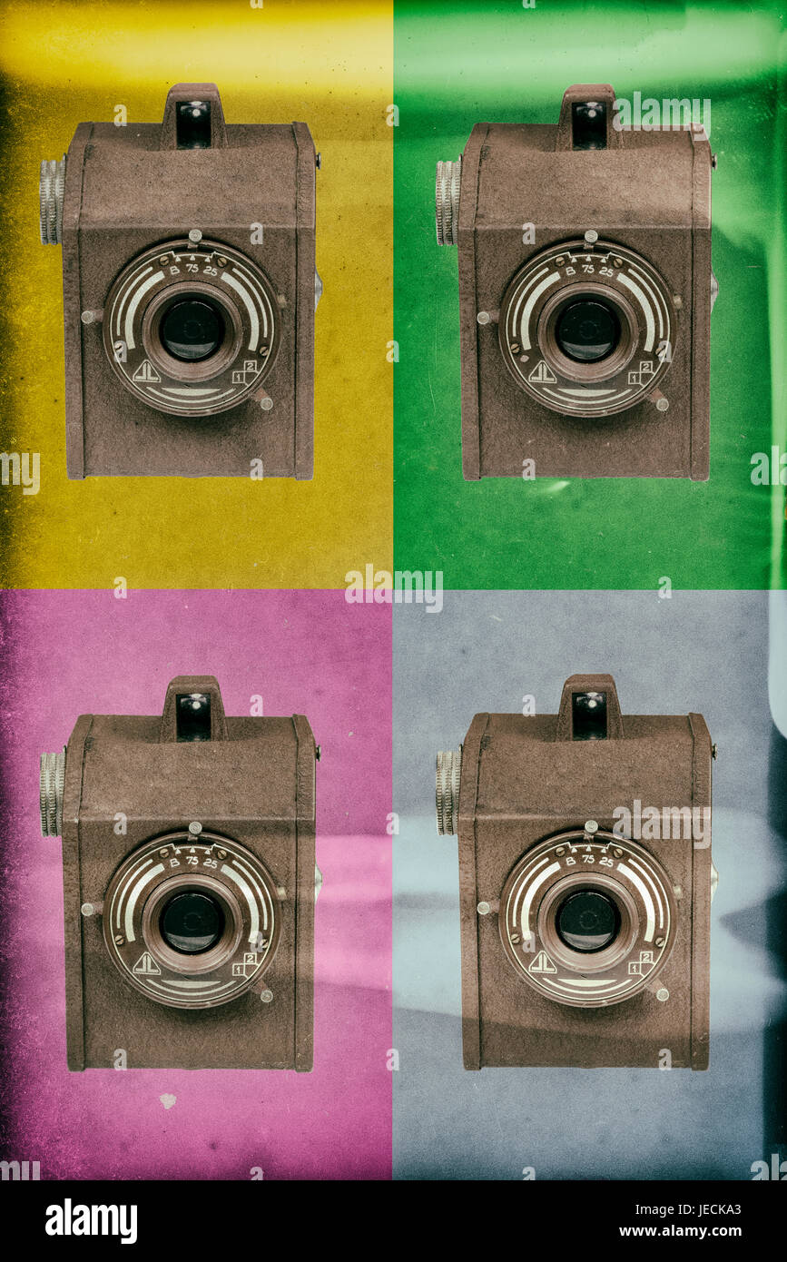 A vintage camera set against a vibrant four color background ...