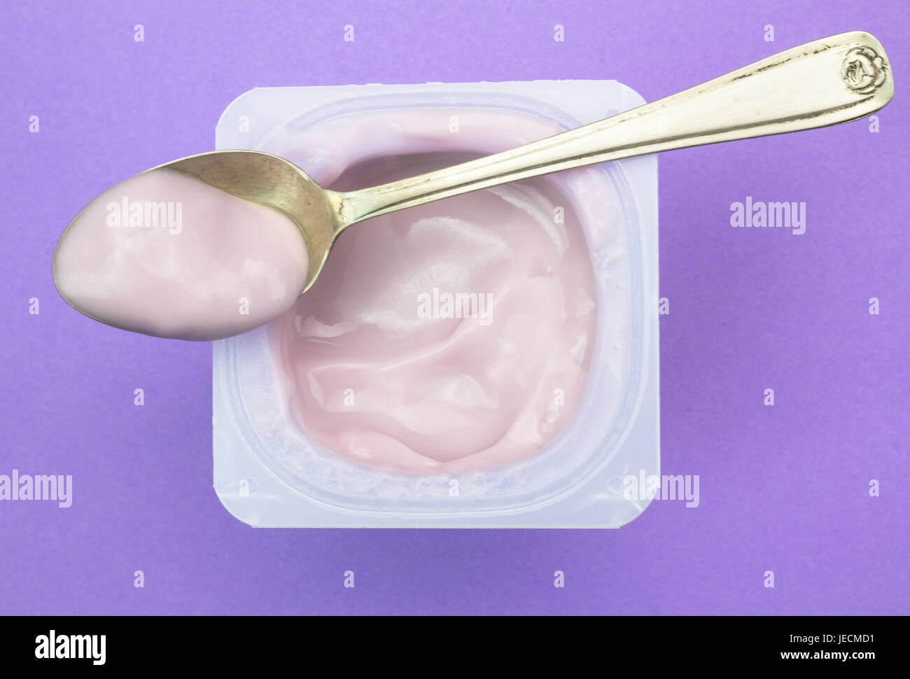 Healthy strawberry fruit flavored yogurt with natural coloring in ...