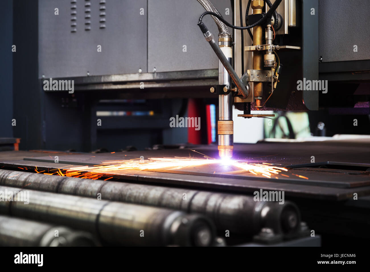 Industrial cnc plasma machine cutting of metal plate Stock Photo - Alamy