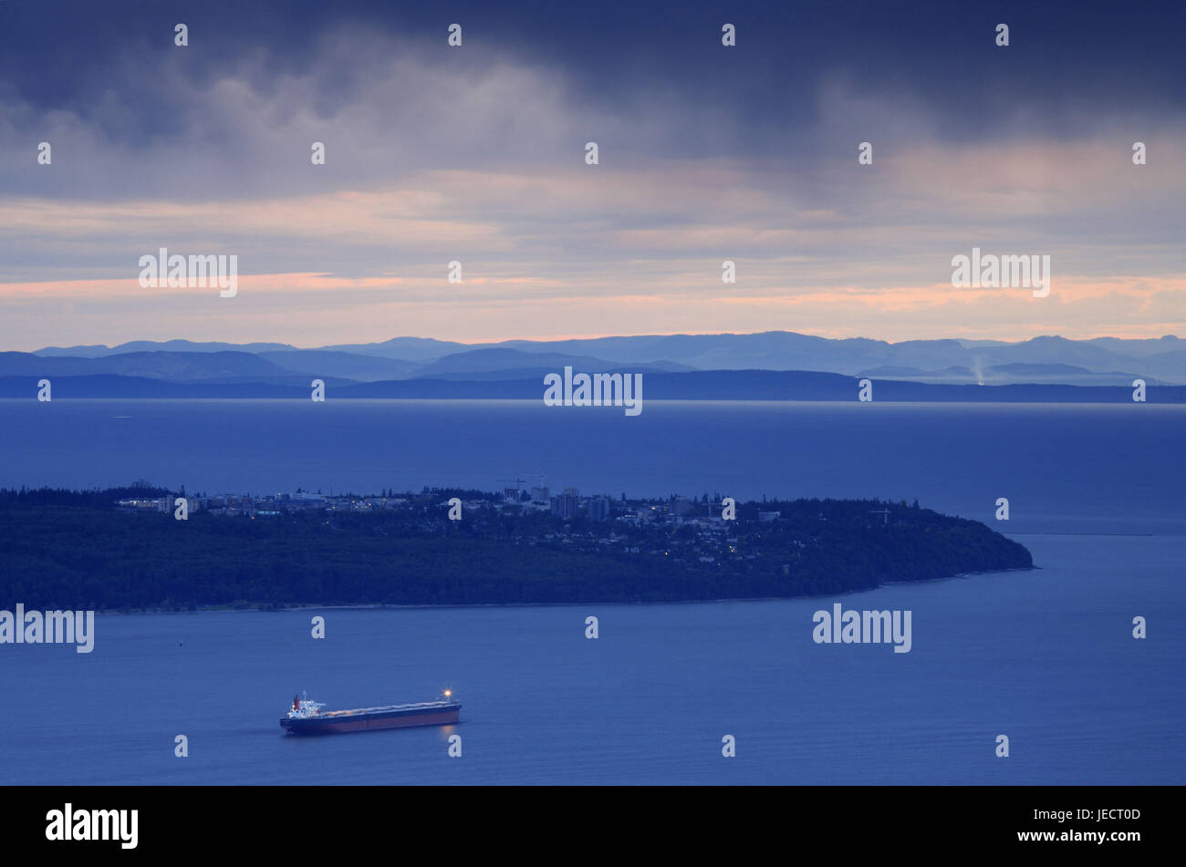 Canada, British Columbia, Vancouver, Strait of Georgia, freighter, dusk ...