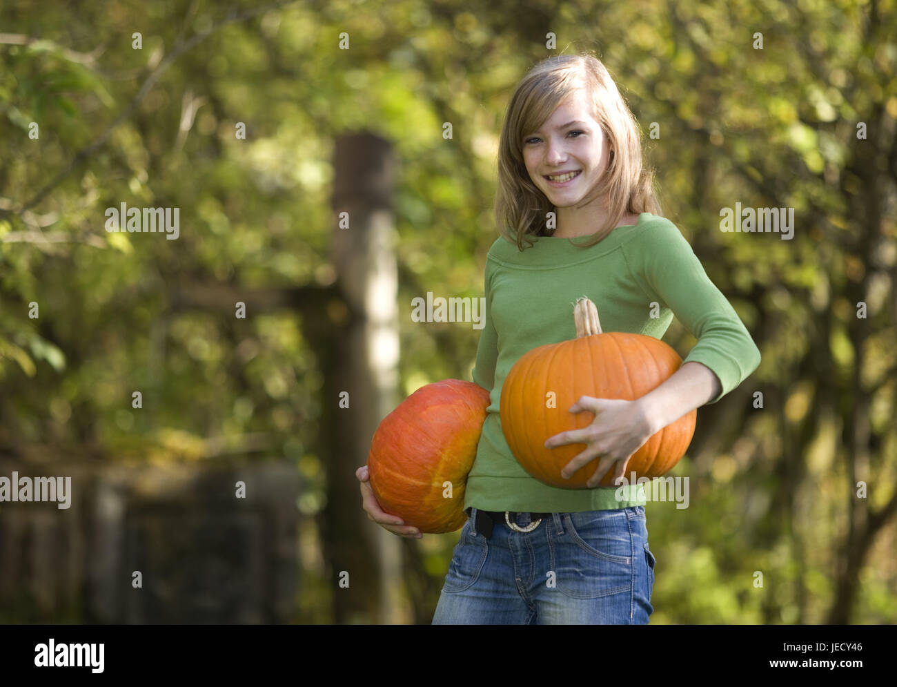 Girls, pumpkins, two, carry, happily, model released, people, teenagers ...