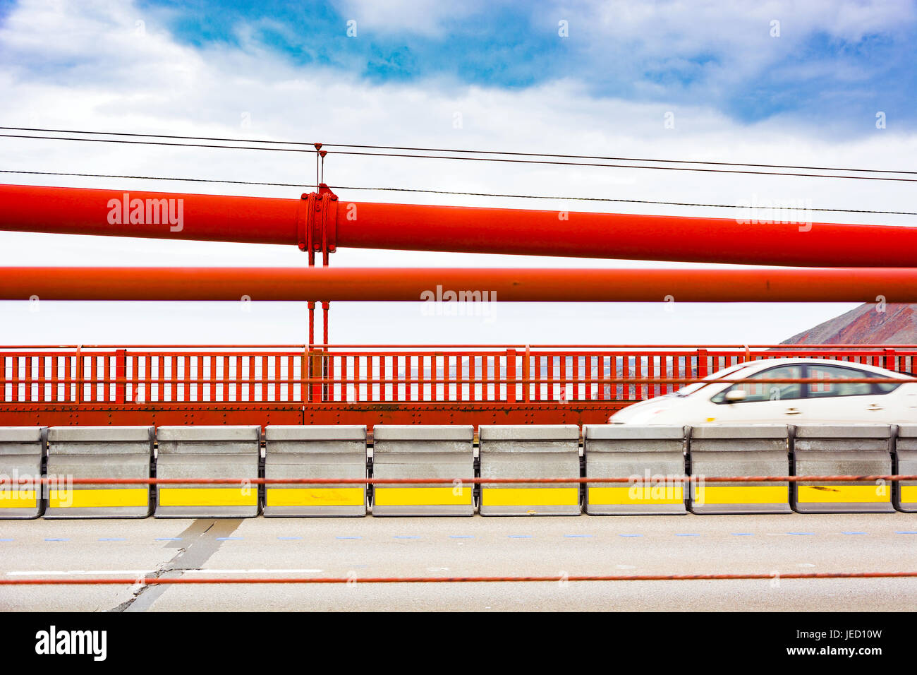 a fast car moving over golden gate bridge Stock Photo - Alamy