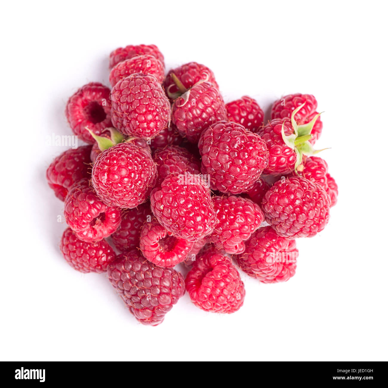 Heap of raspberries isolated on white background Stock Photo - Alamy