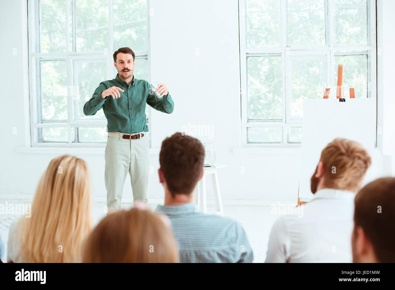 Speaker at Business Meeting in the conference hall Stock Photo - Alamy