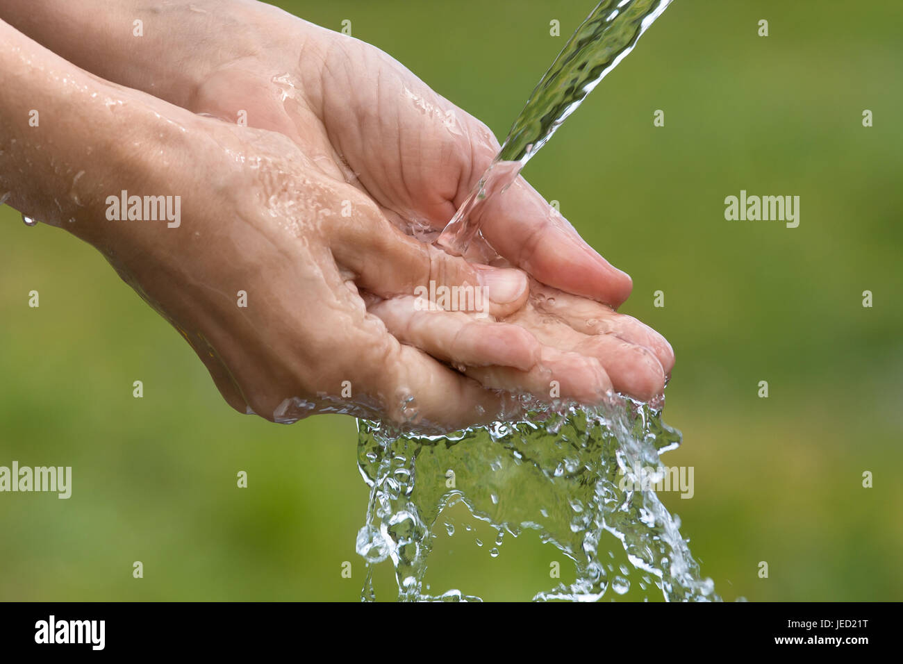 Person hands washing water hi-res stock photography and images - Alamy