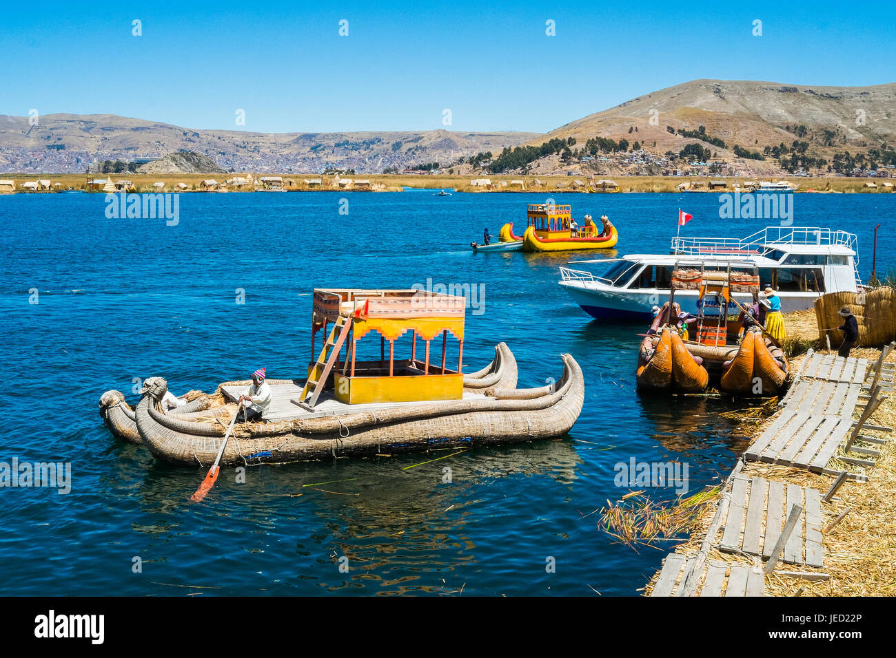 Typical boats in Uros floating islands, Puno, Peru Stock Photo - Alamy