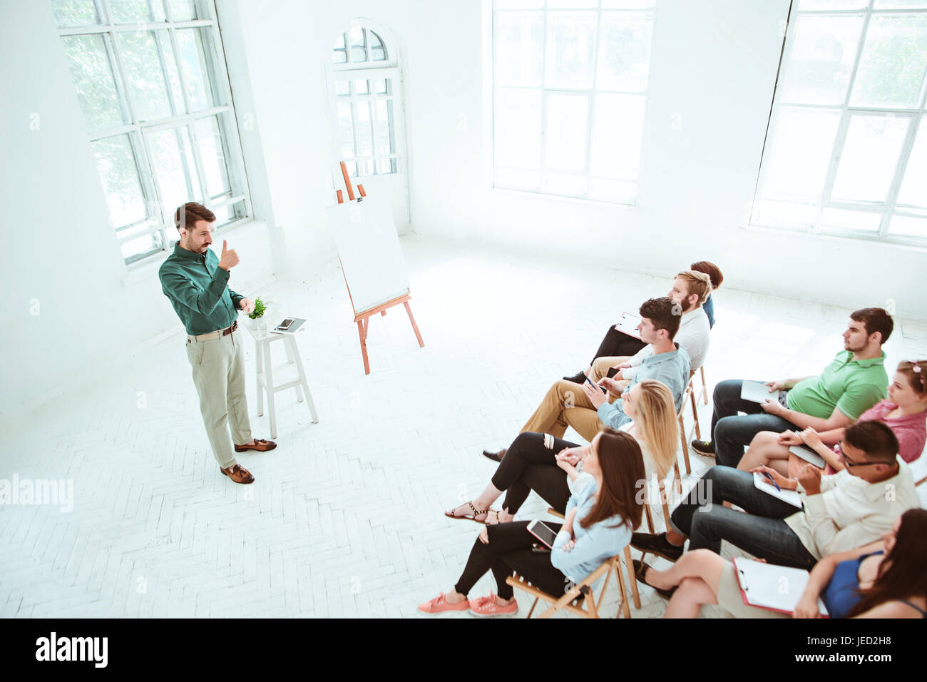 Speaker at Business Meeting in the conference hall Stock Photo - Alamy