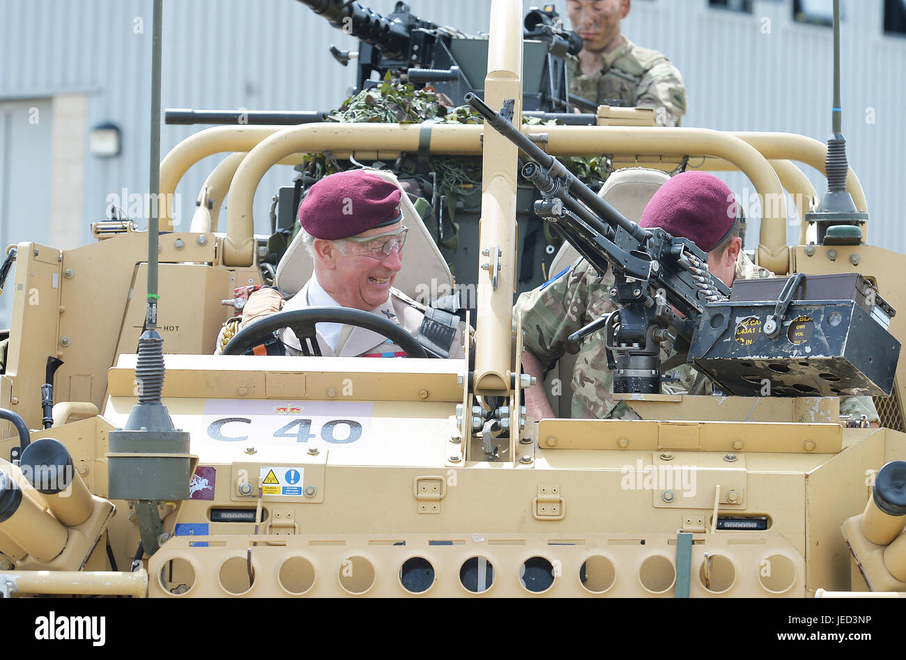 The Prince of Wales driving a Jackal armoured vehicle during a visit to ...