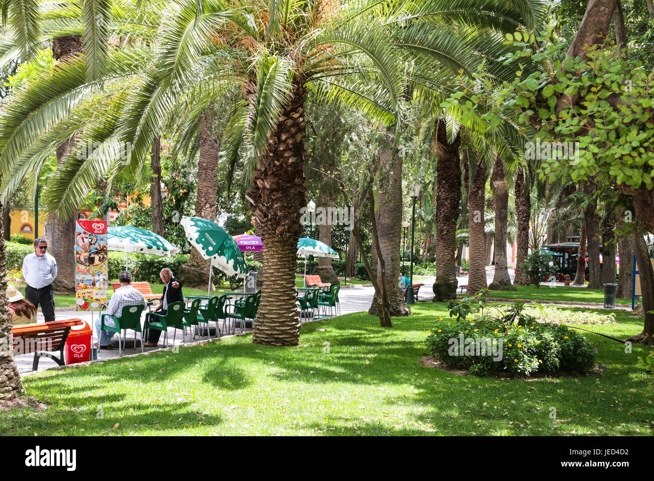 FARO, PORTUGAL - JUNE 25, 2006: people in urban park in Faro city in ...