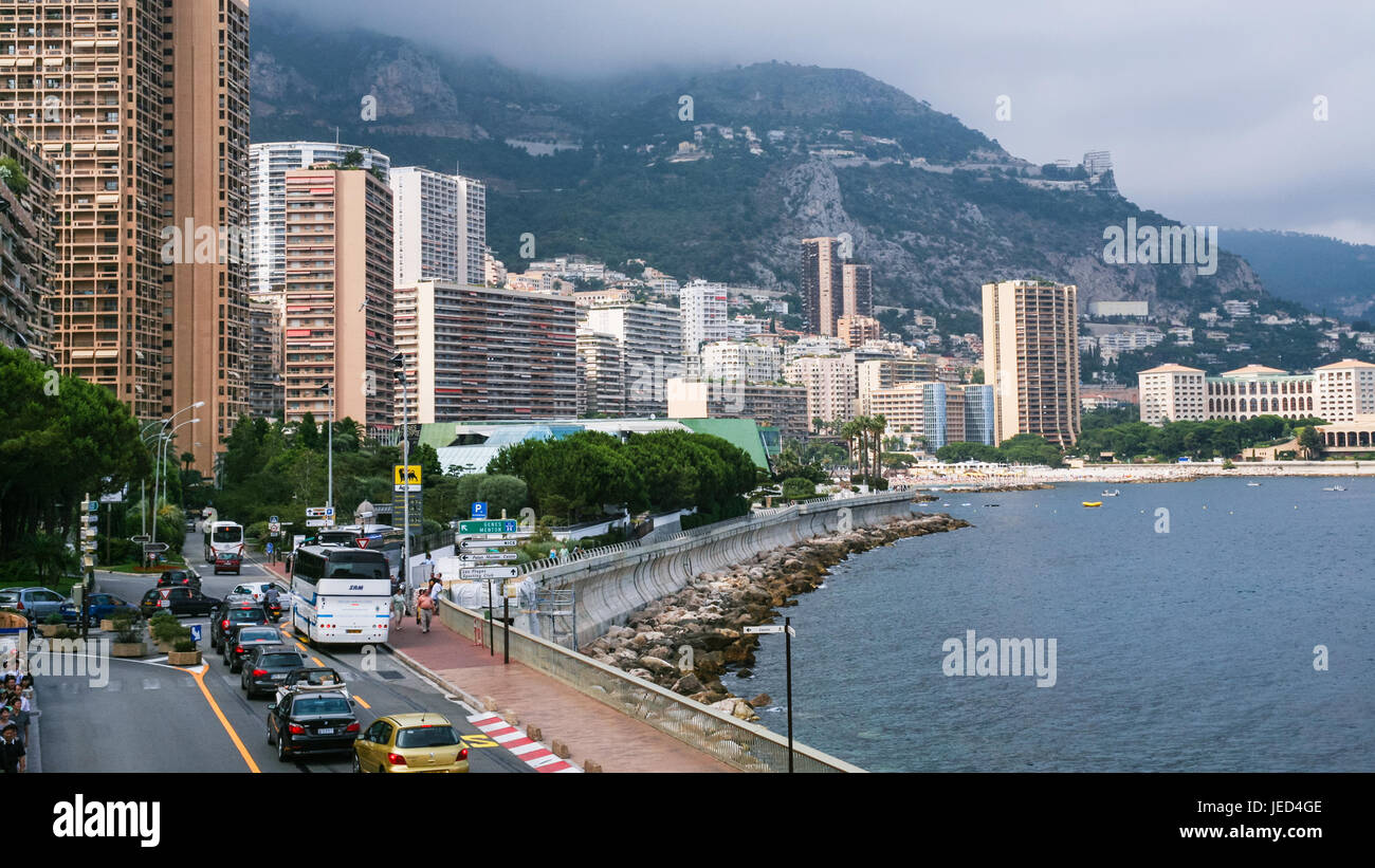 MONACO CITY, MONACO - JULY 6, 2008: tourists and cars on waterfront of ...