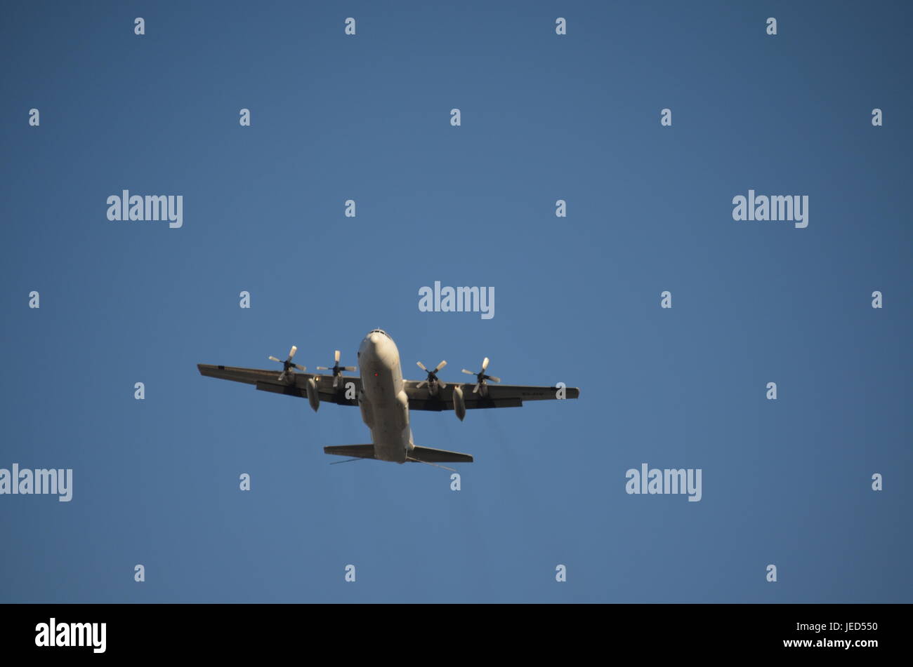 Military Four Helix Aircraft Flying Upwards Stock Photo - Alamy