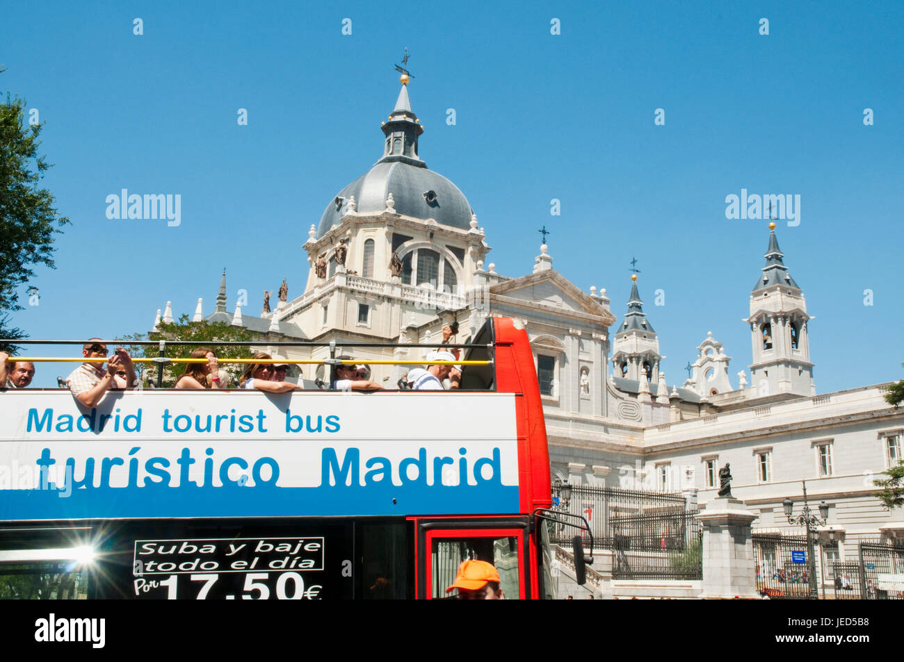 Tourist bus and The Almudena cathedral. Madrid, Spain Stock Photo - Alamy