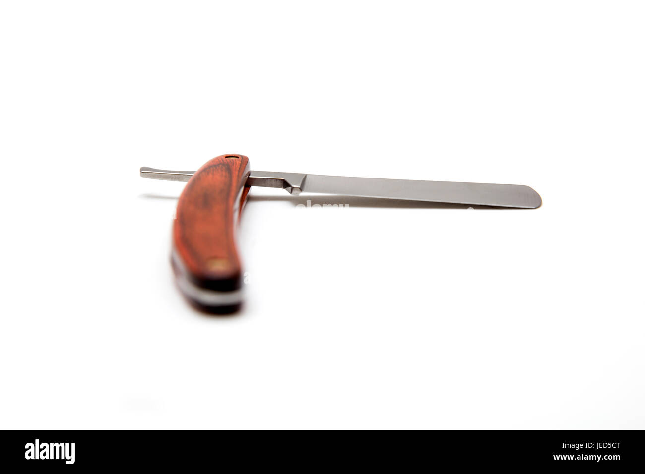 Vintage straight razor isolated on white background Stock Photo - Alamy