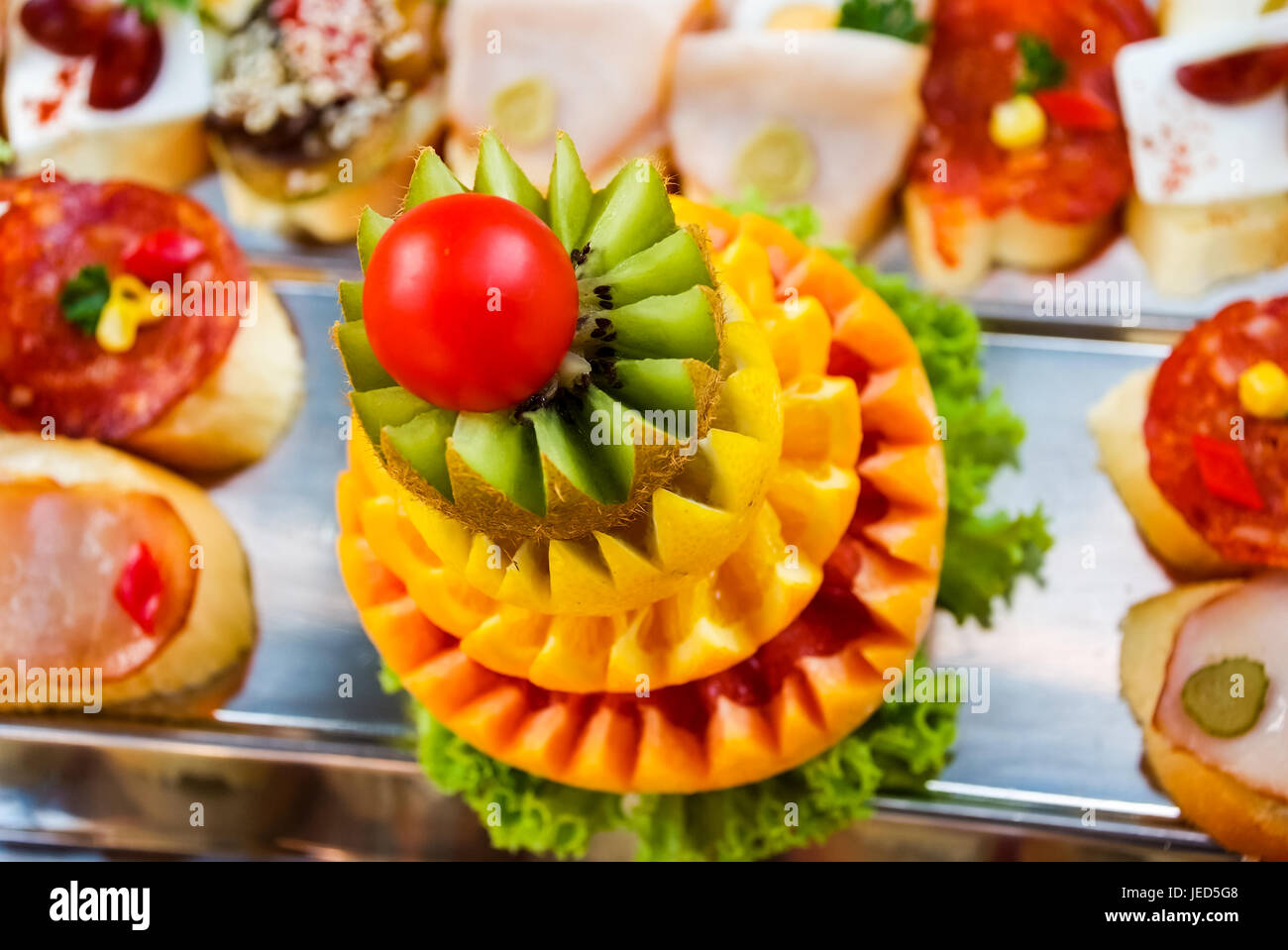 Close up view at compositions of fresh fruit cut for buffet Stock Photo ...