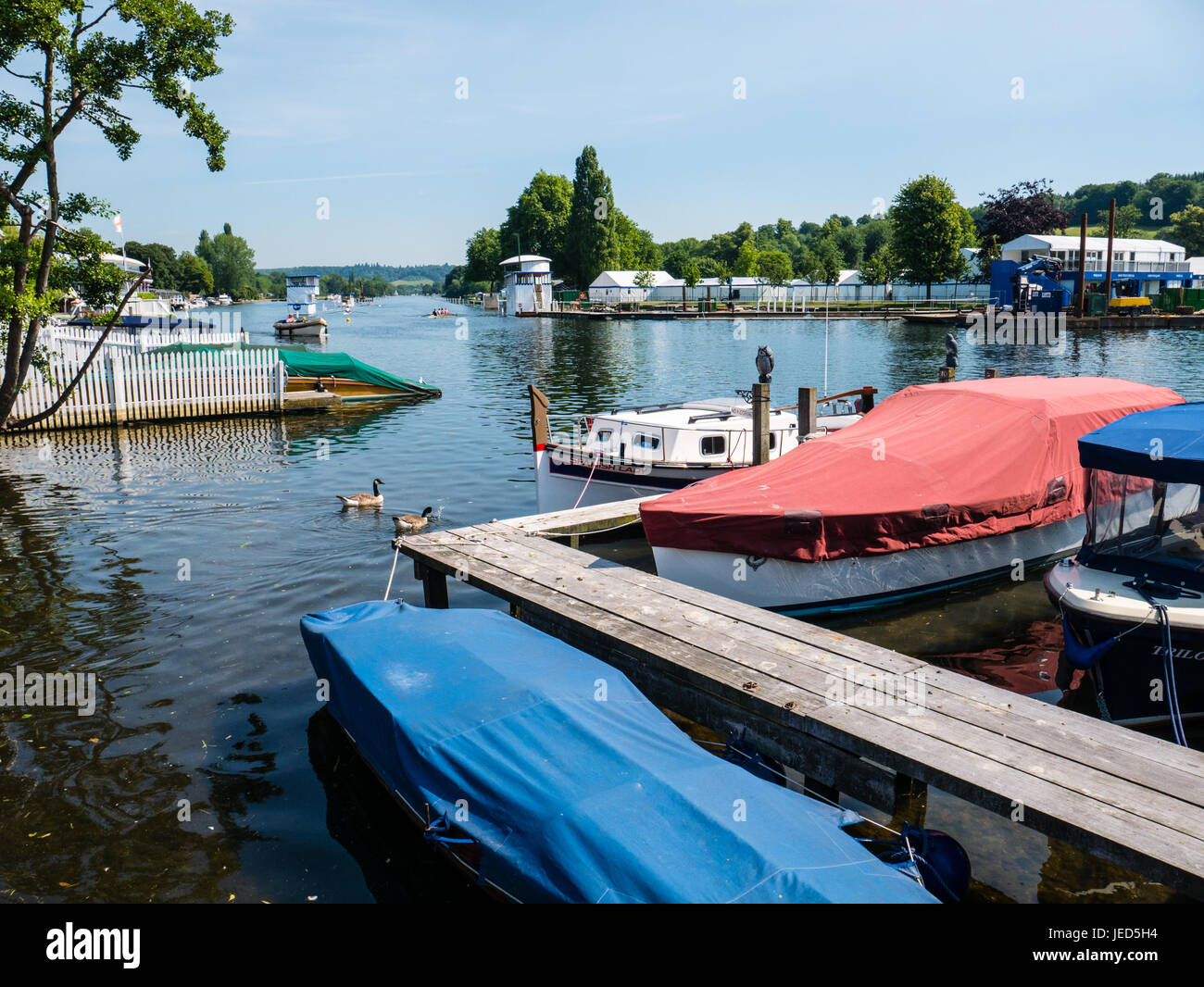 Red and Blue boat Covers, Small Boats with Rowing club in Background ...