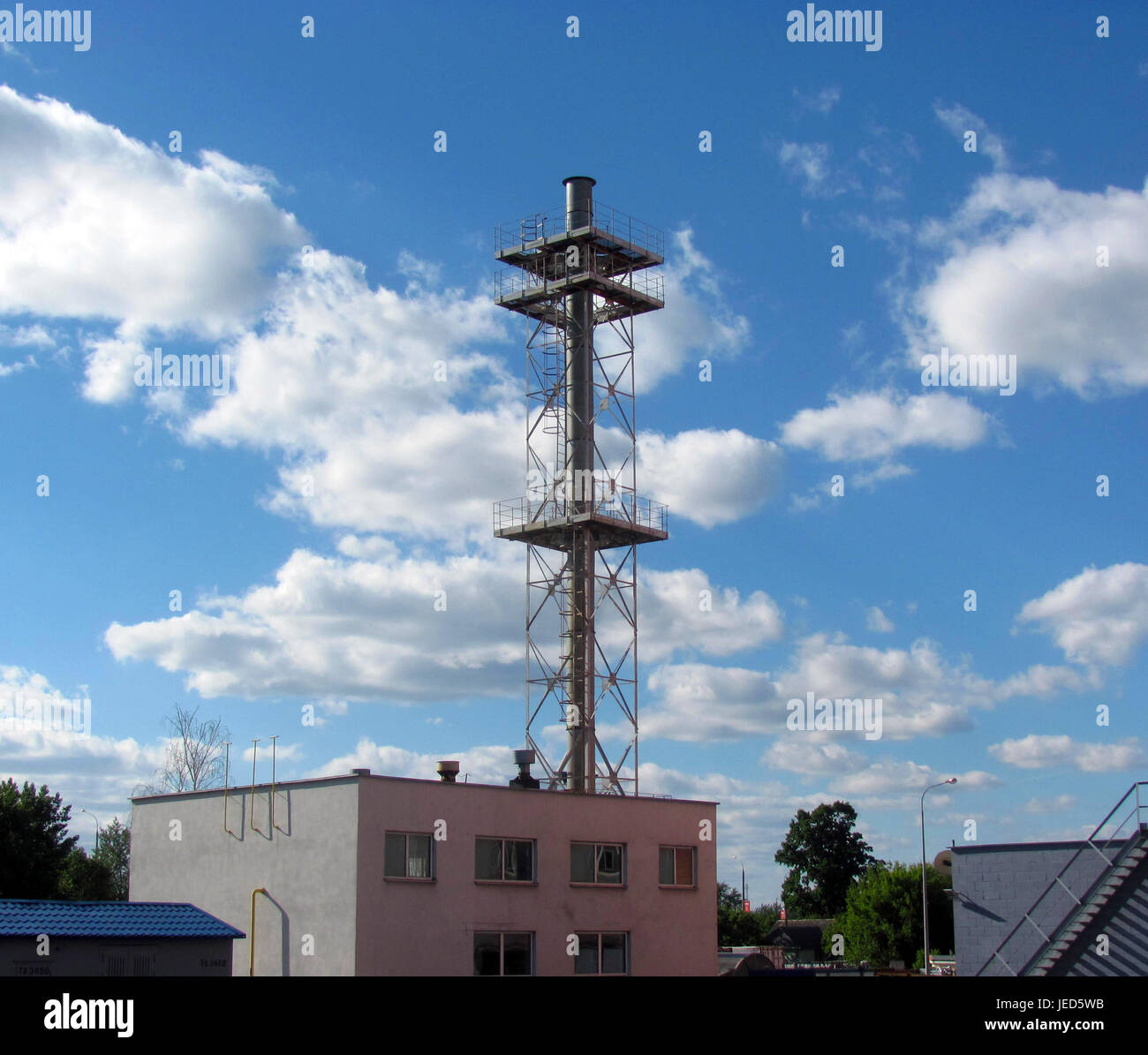 Trumpet over building, against the blue sky Stock Photo - Alamy