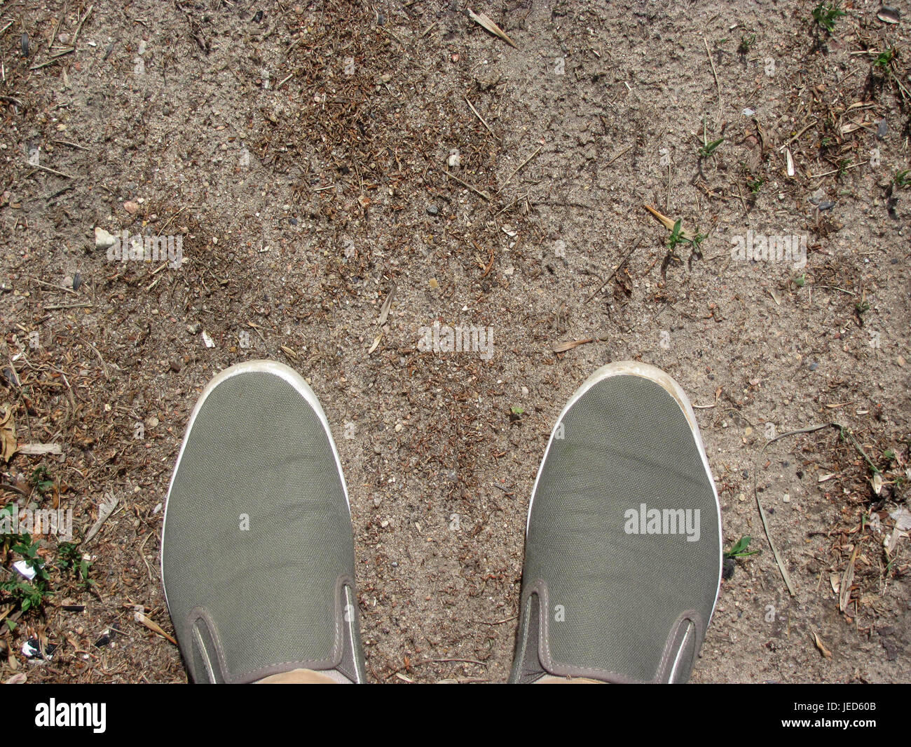 shoes on urban background of ground Stock Photo - Alamy