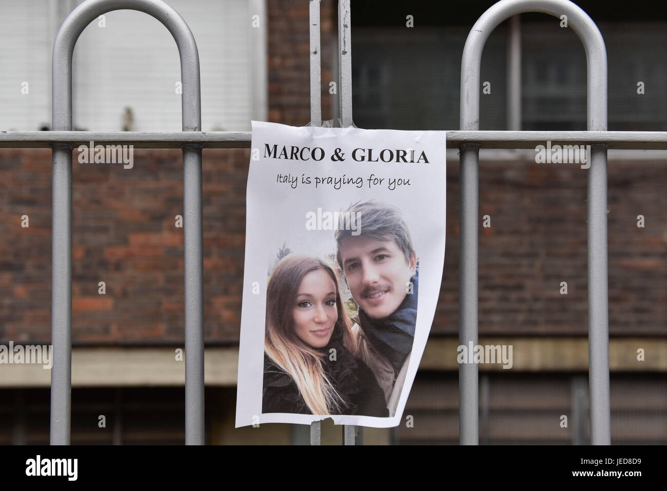 London, UK. 23rd June, 2017. A missing persons sign hangs on a railing ...