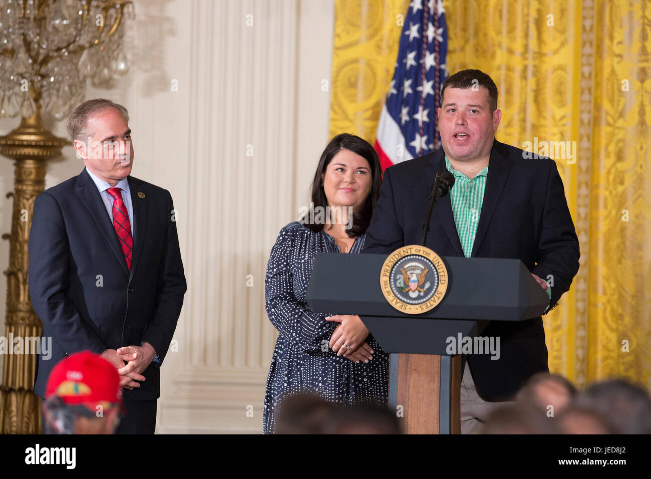 Sergeant Michael Verardo (right) speaks with his wife Sarah Verardo ...