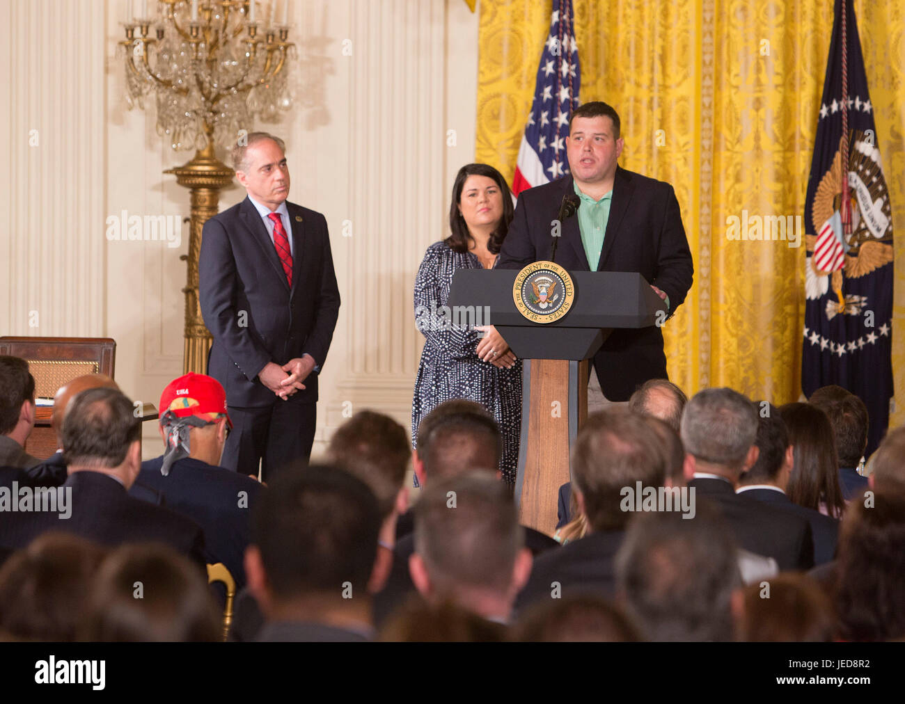 Sergeant Michael Verardo (right) speaks with his wife Sarah Verardo ...