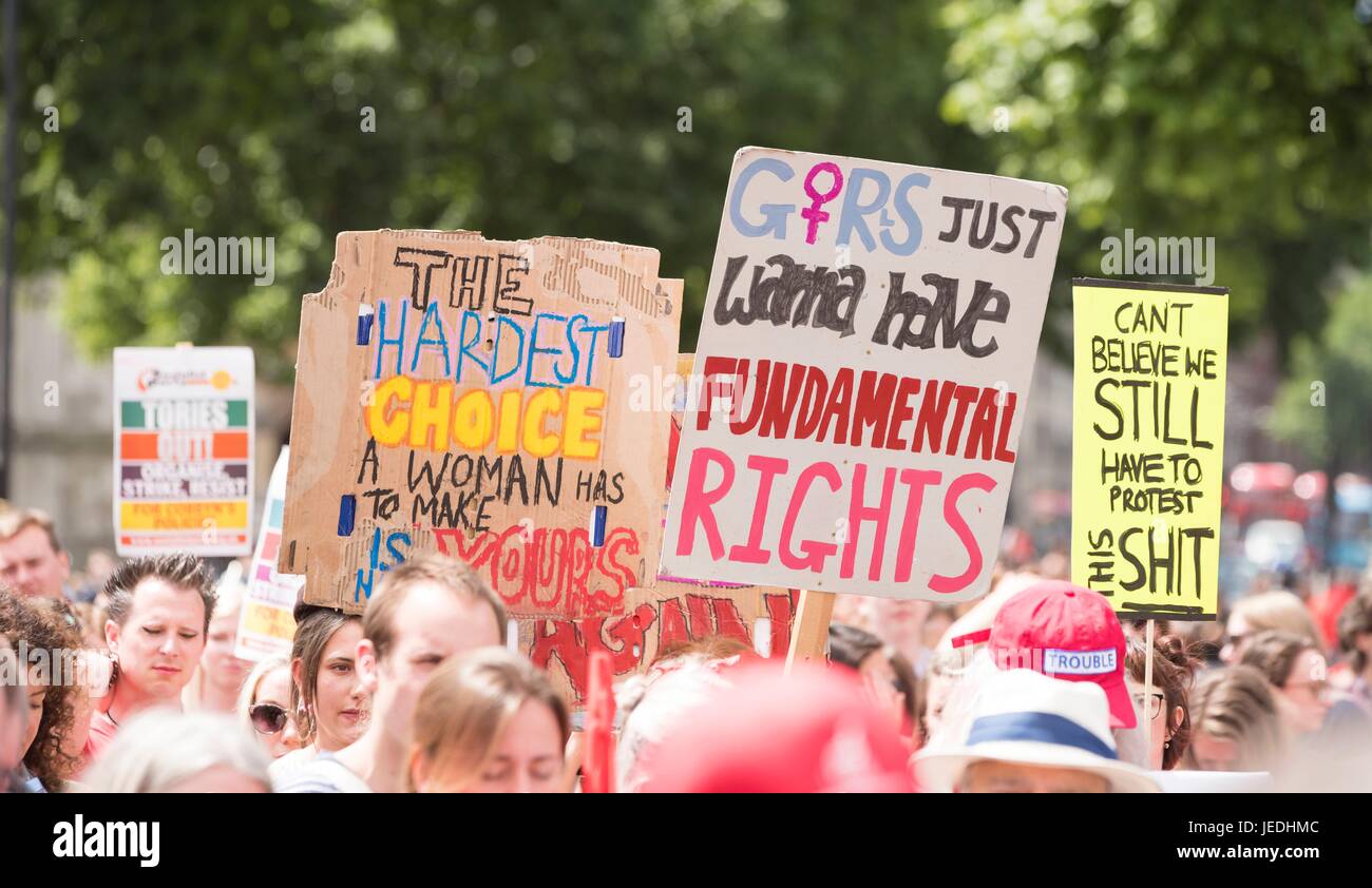 Protesters with a banners at WomenÂ s march against the UDP deal ...