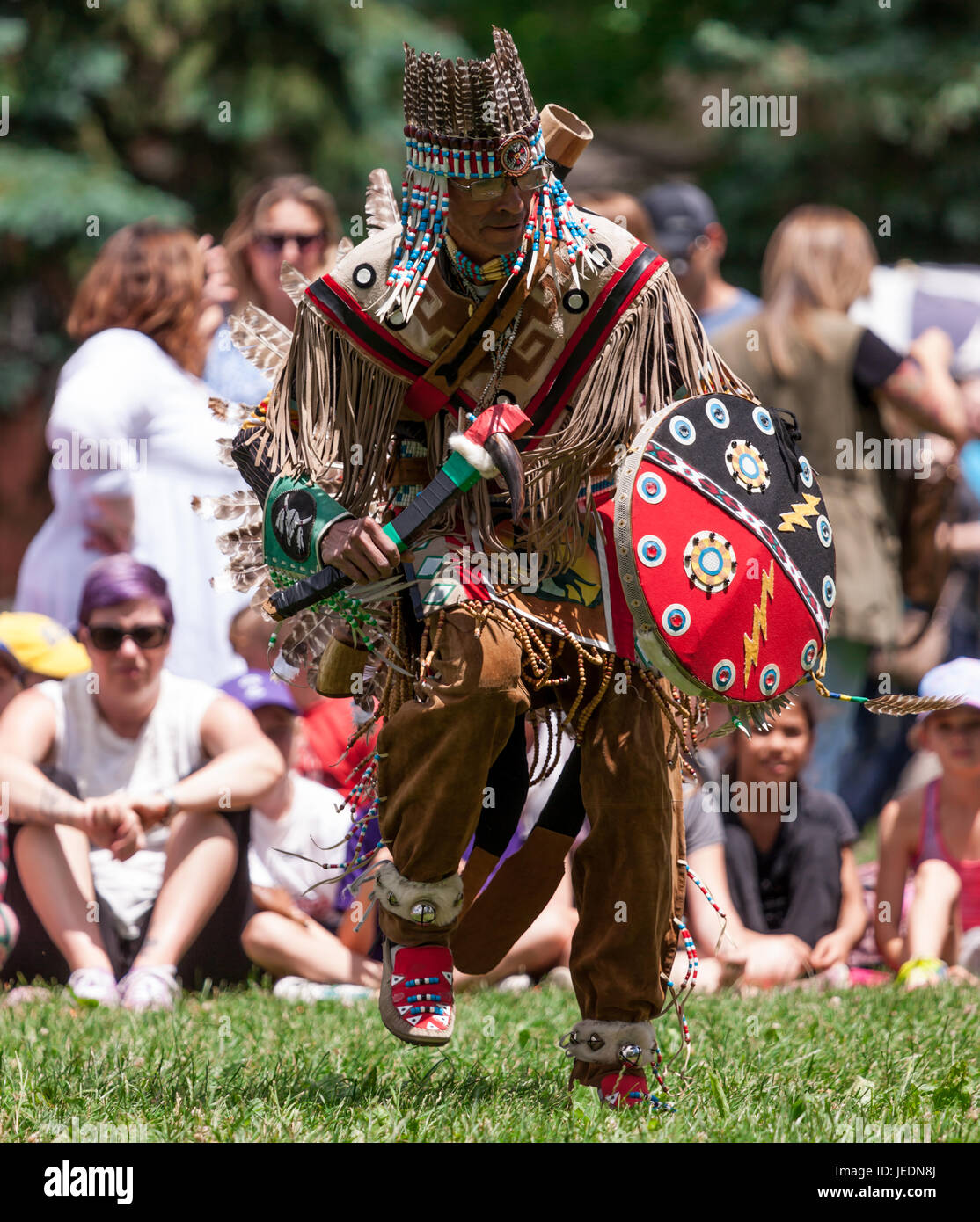 Members of Canada's First Nations communities celebrate and dance ...