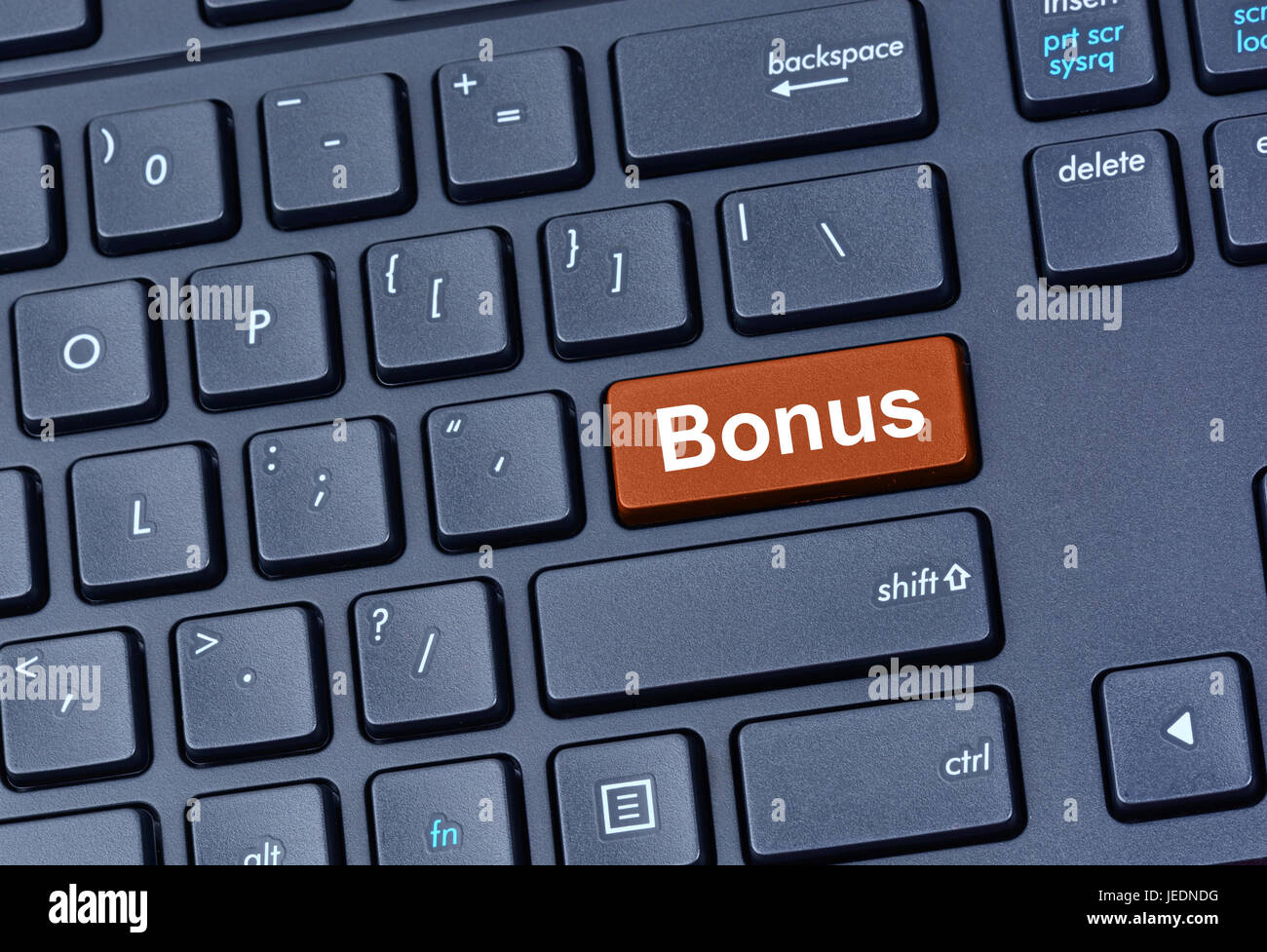 Bonus on computer keyboard button Stock Photo - Alamy