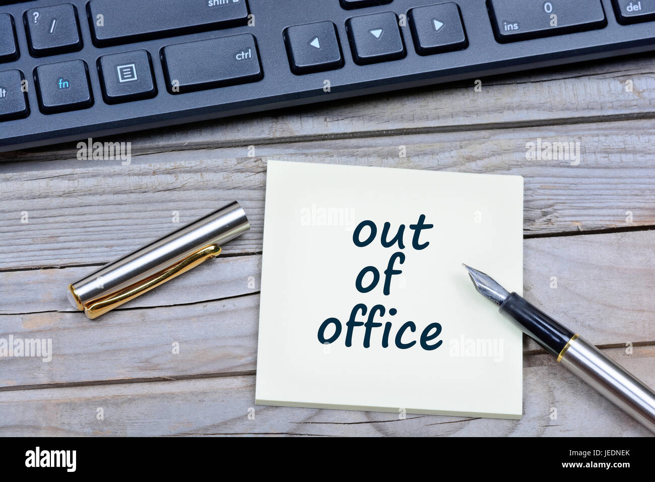 Out of office words on notes closeup Stock Photo - Alamy
