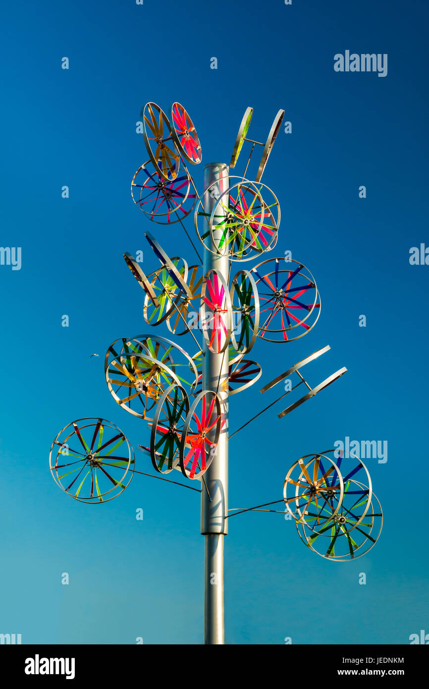 Public artwork of a tree made of colorful wheels Stock Photo - Alamy
