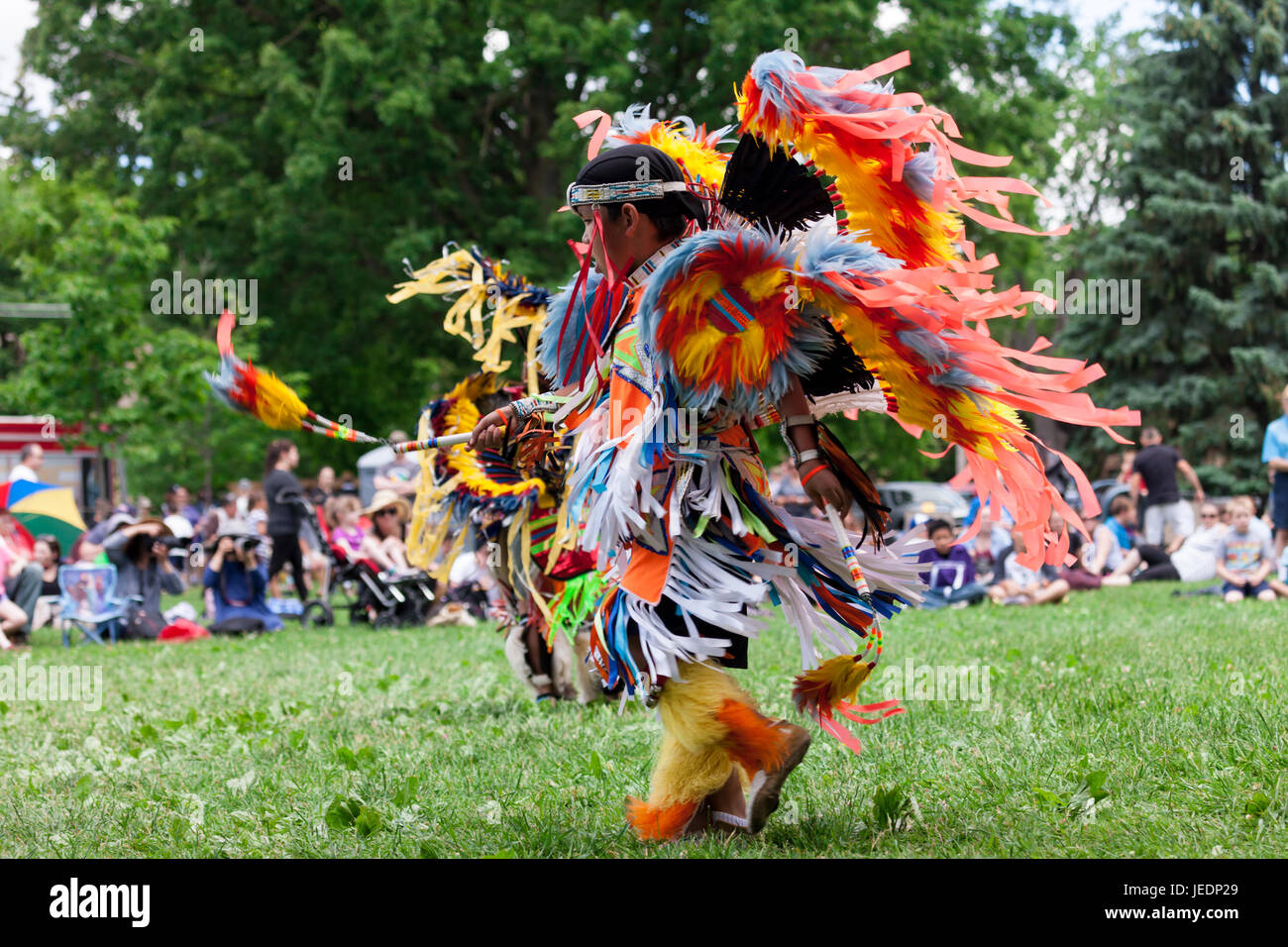 Members of Canada's First Nations communities celebrate and dance ...