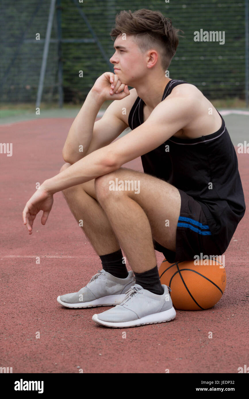 Tired man playing basketball hi-res stock photography and images - Alamy