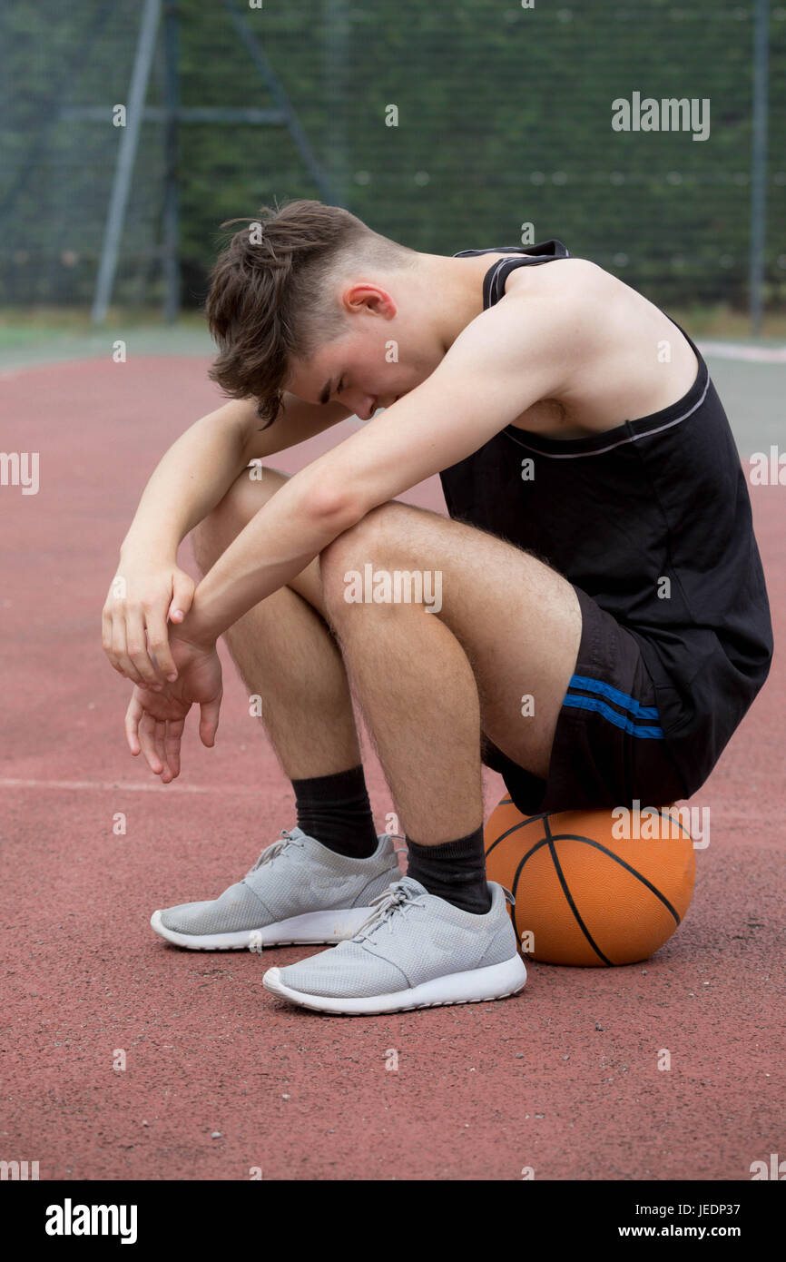 Tired man playing basketball hi-res stock photography and images - Alamy