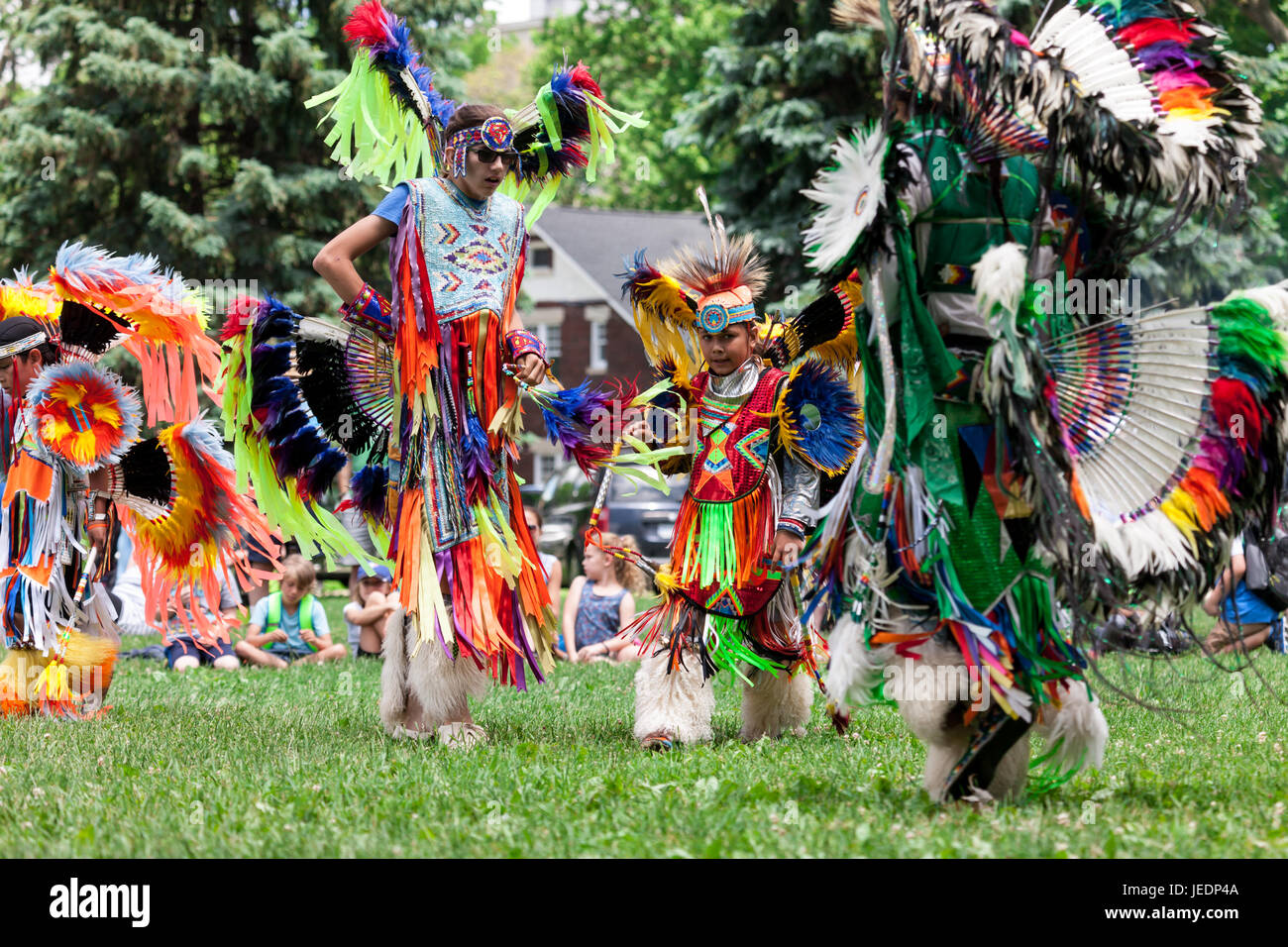 Members of Canada's First Nations communities celebrate and dance ...
