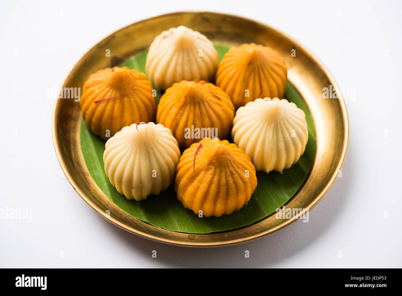 A modak is an Indian sweet dumpling popular in India. It is called ...