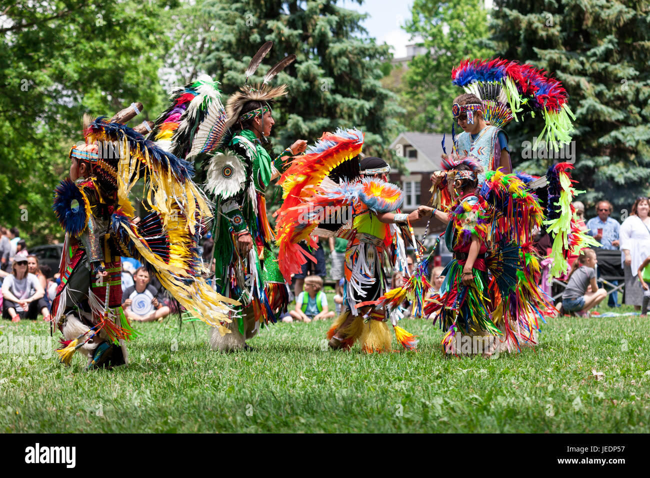 Members of Canada's First Nations communities celebrate and dance ...